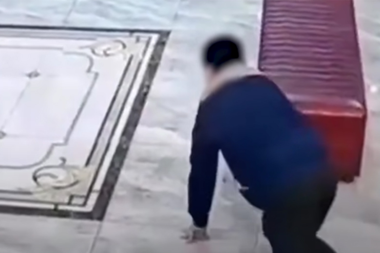 You won't believe why this man was crawling on the floor